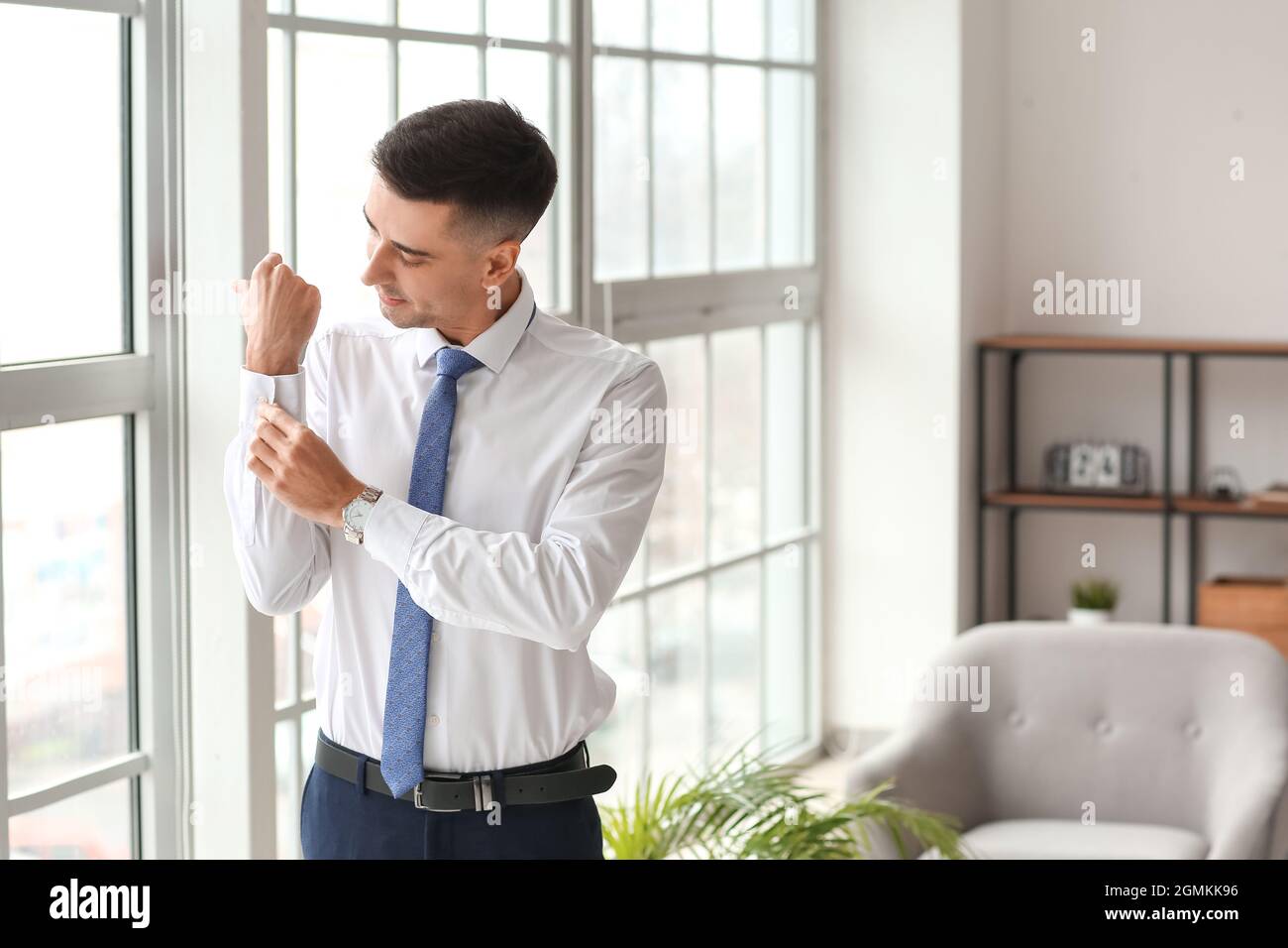 Stylish men in suit at home hi-res stock photography and images - Alamy