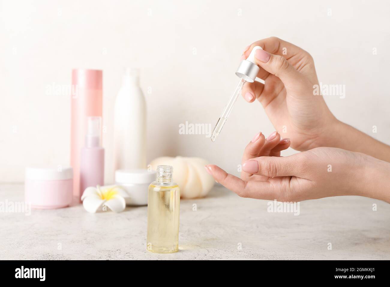 Applying essential oil on hands hi-res stock photography and images - Alamy