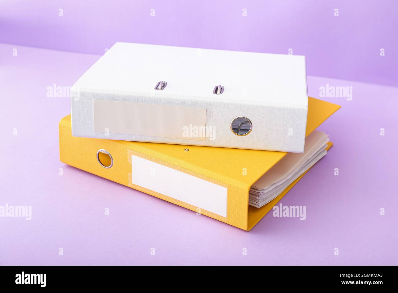 Office folders on color background Stock Photo - Alamy