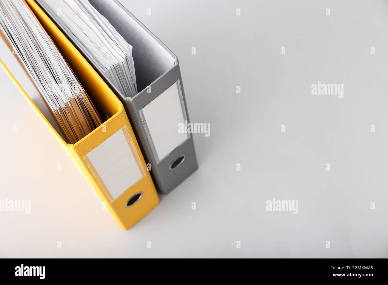Office folders on white background Stock Photo - Alamy