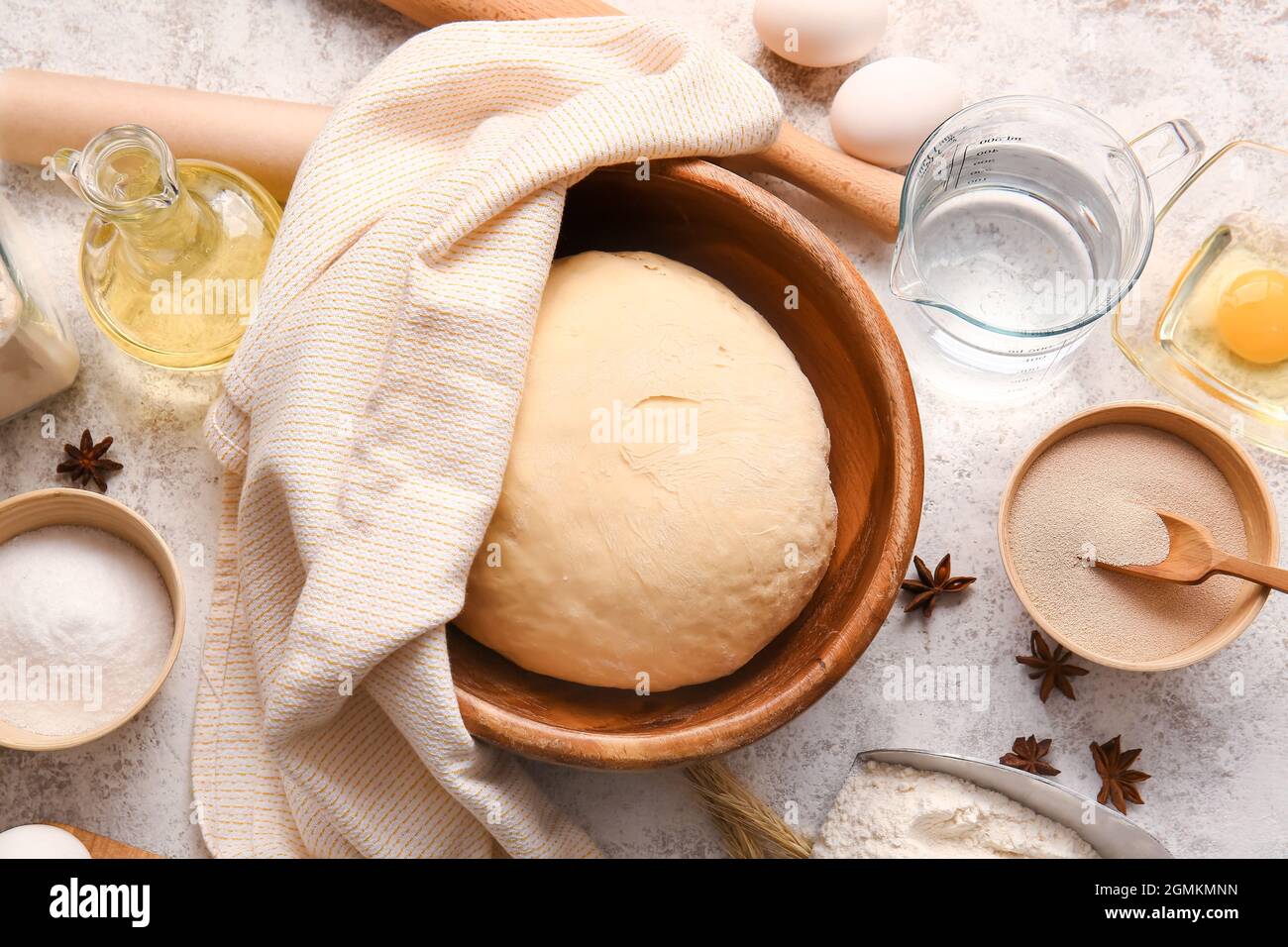 Composition with fresh dough on light background Stock Photo - Alamy