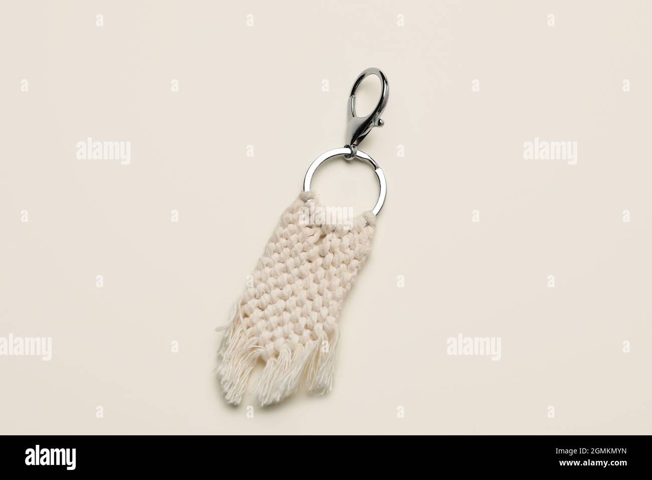 Handmade cotton keychain on light background Stock Photo - Alamy