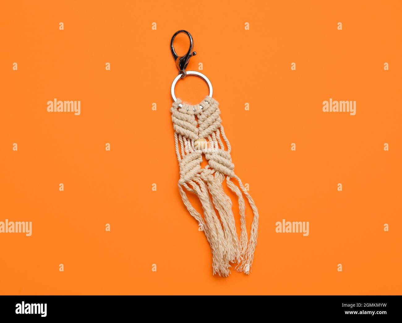 Handmade cotton keychain on color background Stock Photo - Alamy