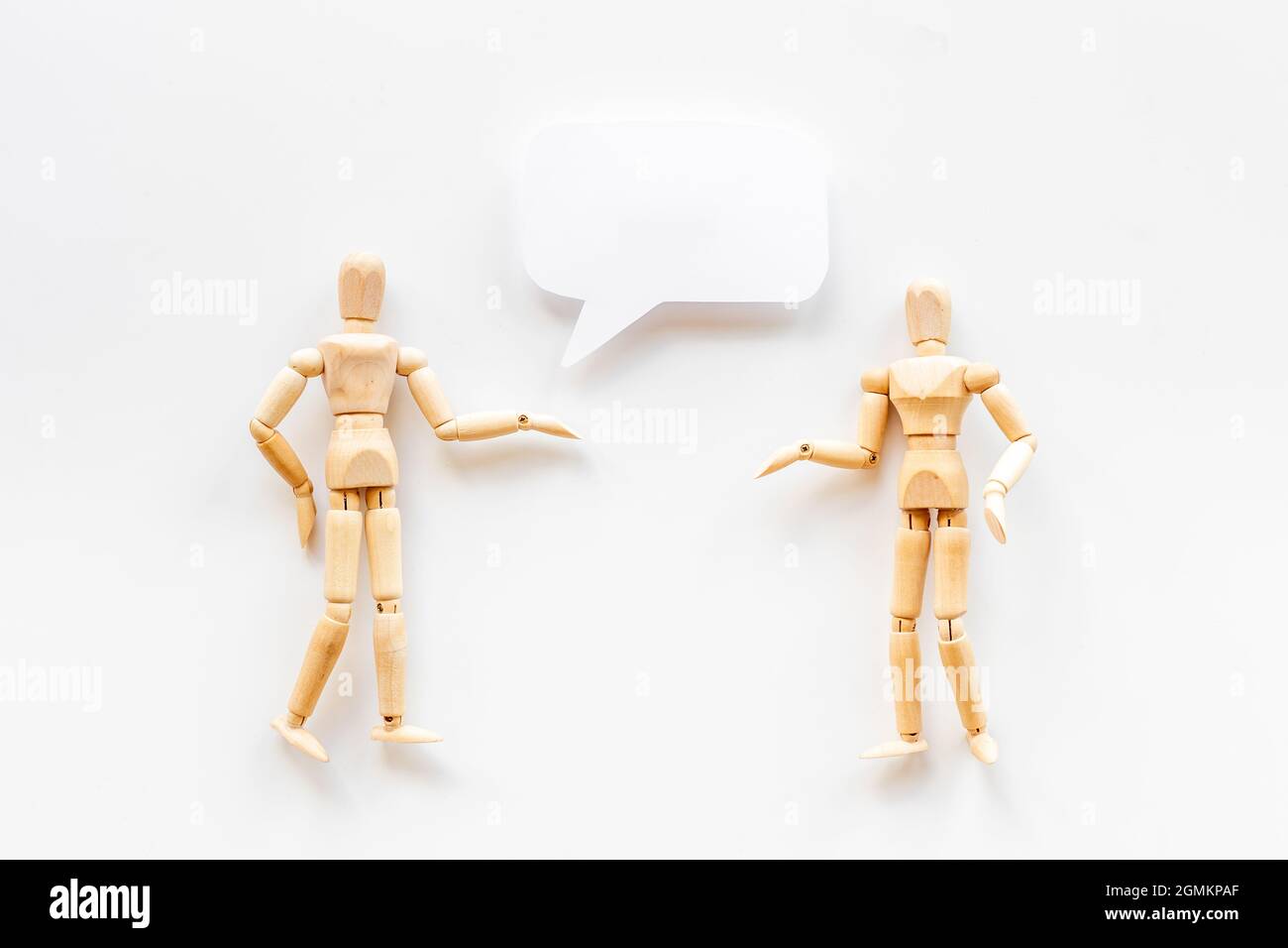 Personal communication concept. Two wooden mannequin figures connection ...