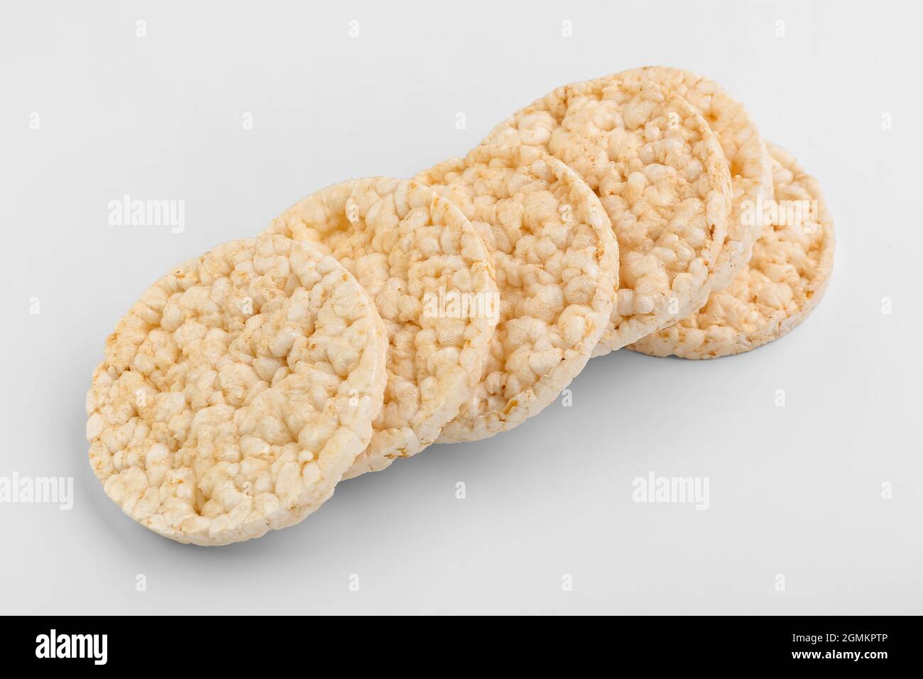 Puffed corn crackers on white background Stock Photo - Alamy
