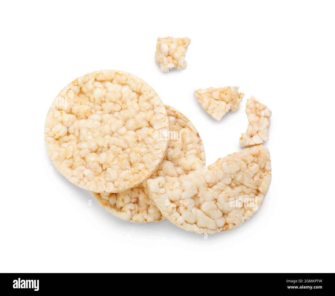 Puffed crispy rice crackers on white background Stock Photo - Alamy