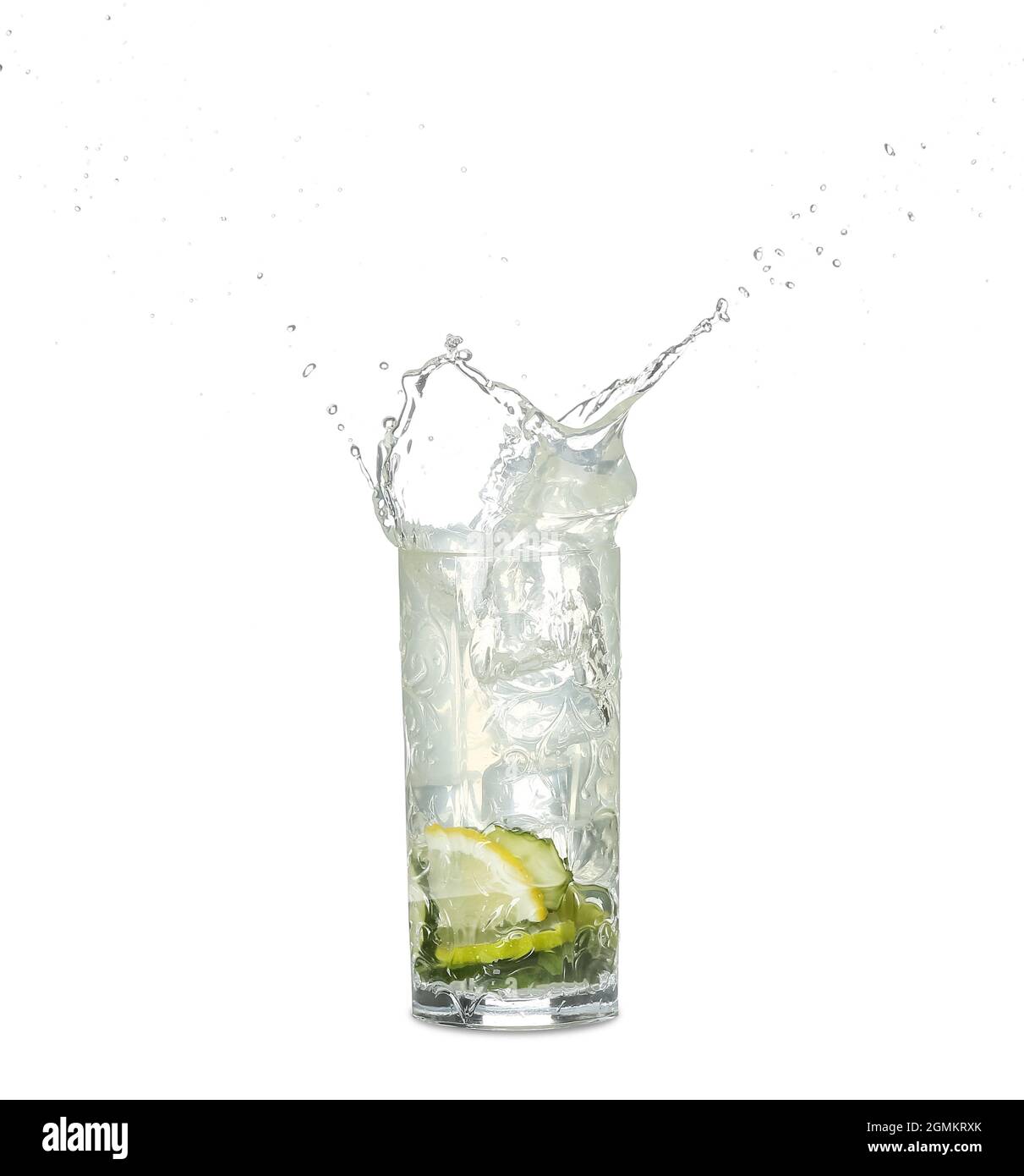 Glass of splashing lemonade on white background Stock Photo - Alamy