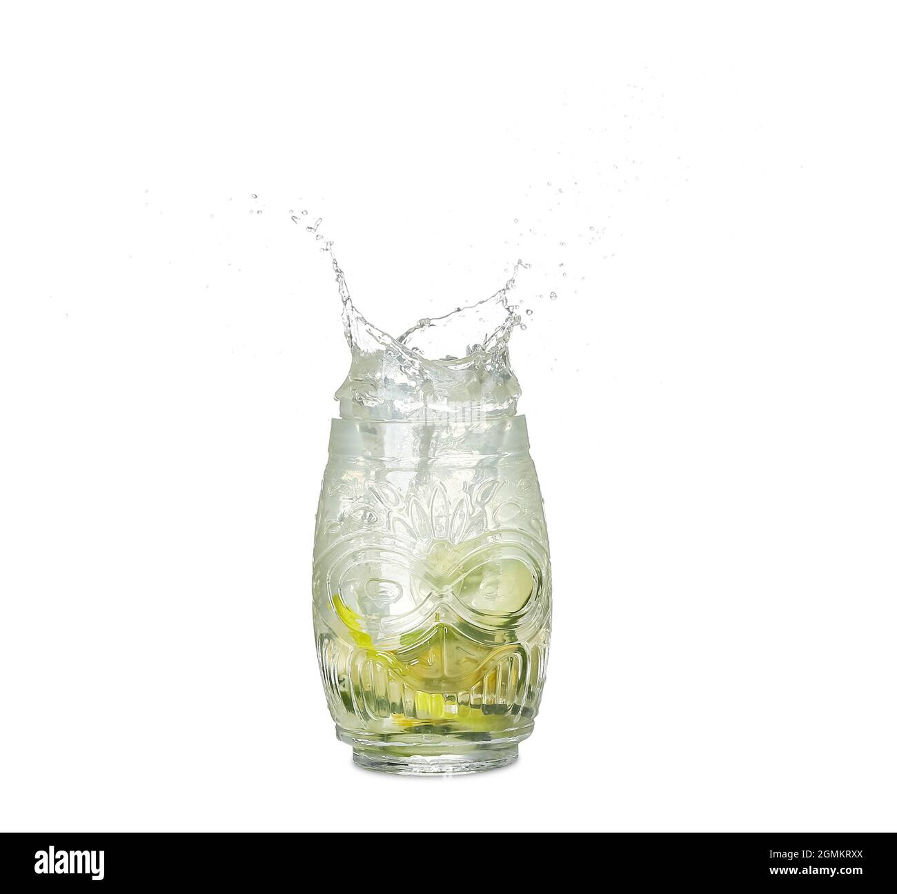 Glass of splashing lemonade on white background Stock Photo - Alamy