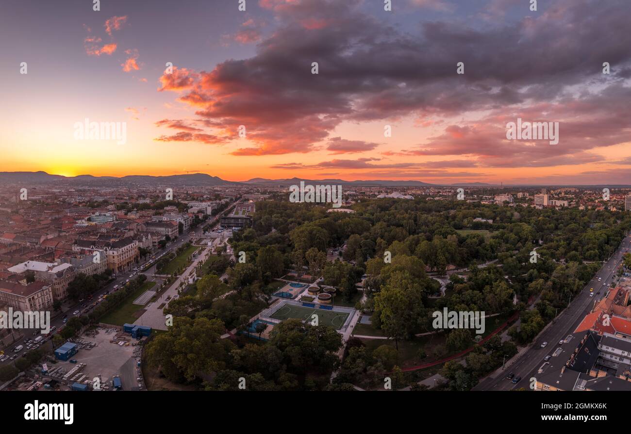 Dramatic colorful sunset sky above Budapest with views of the liget ...