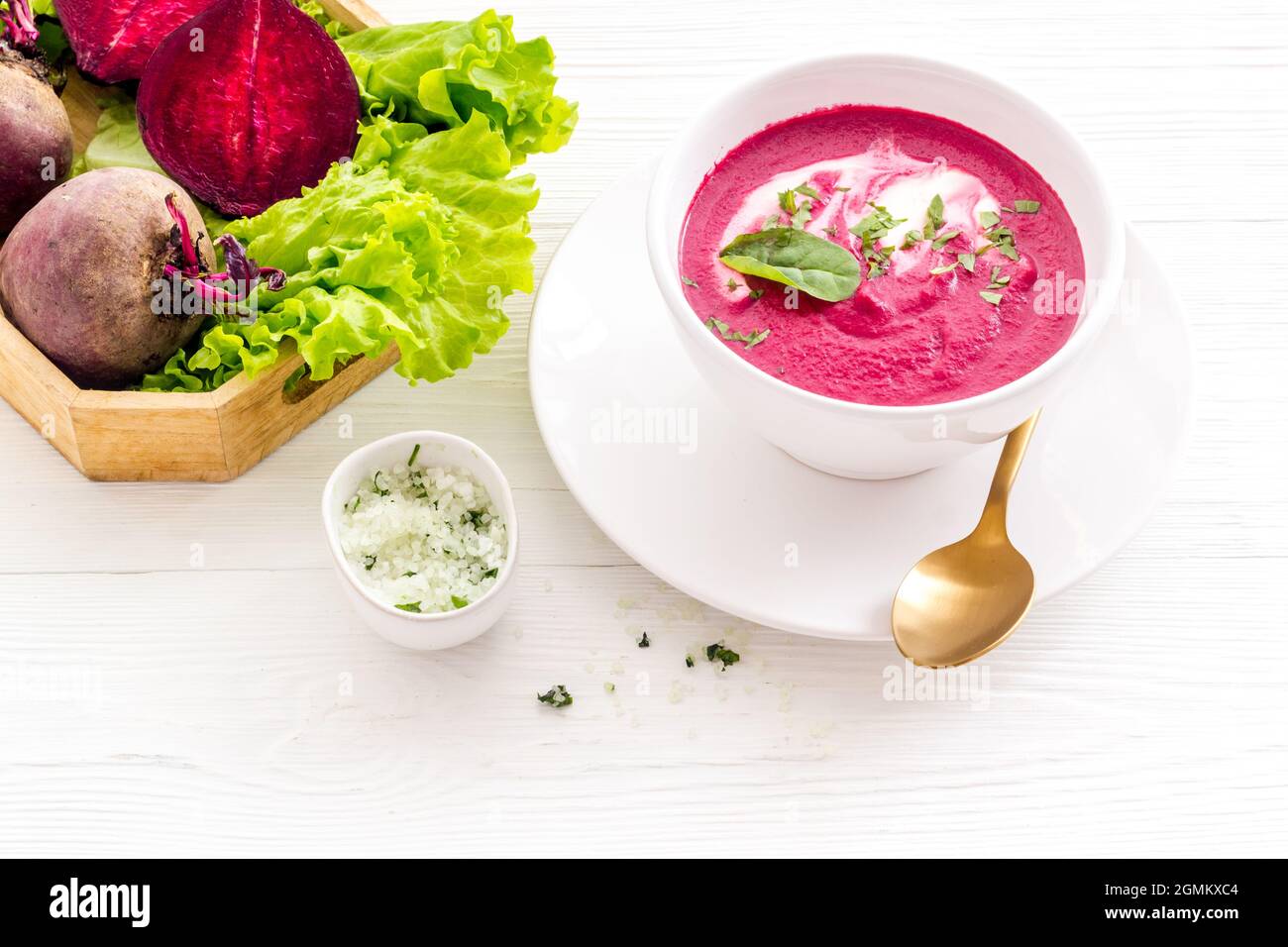 Creamy red beetroot soup with raw beets and sour cream Stock Photo - Alamy