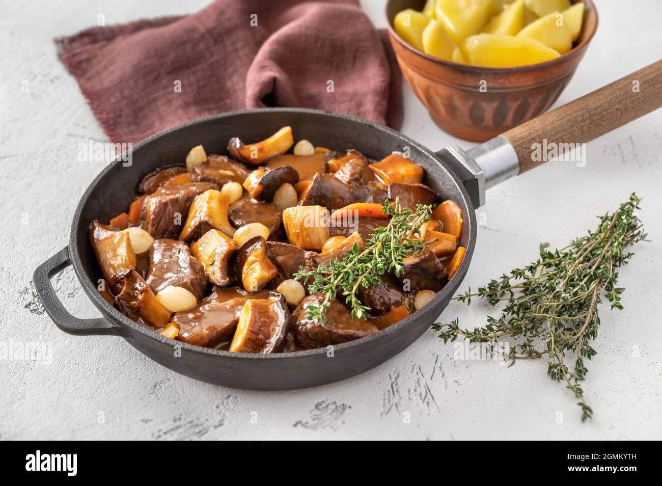 Beef bourguignon - French beef stew in the skillet Stock Photo - Alamy