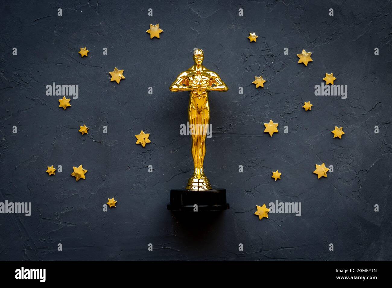Golden movie award statue with stars - best film winner Stock Photo - Alamy