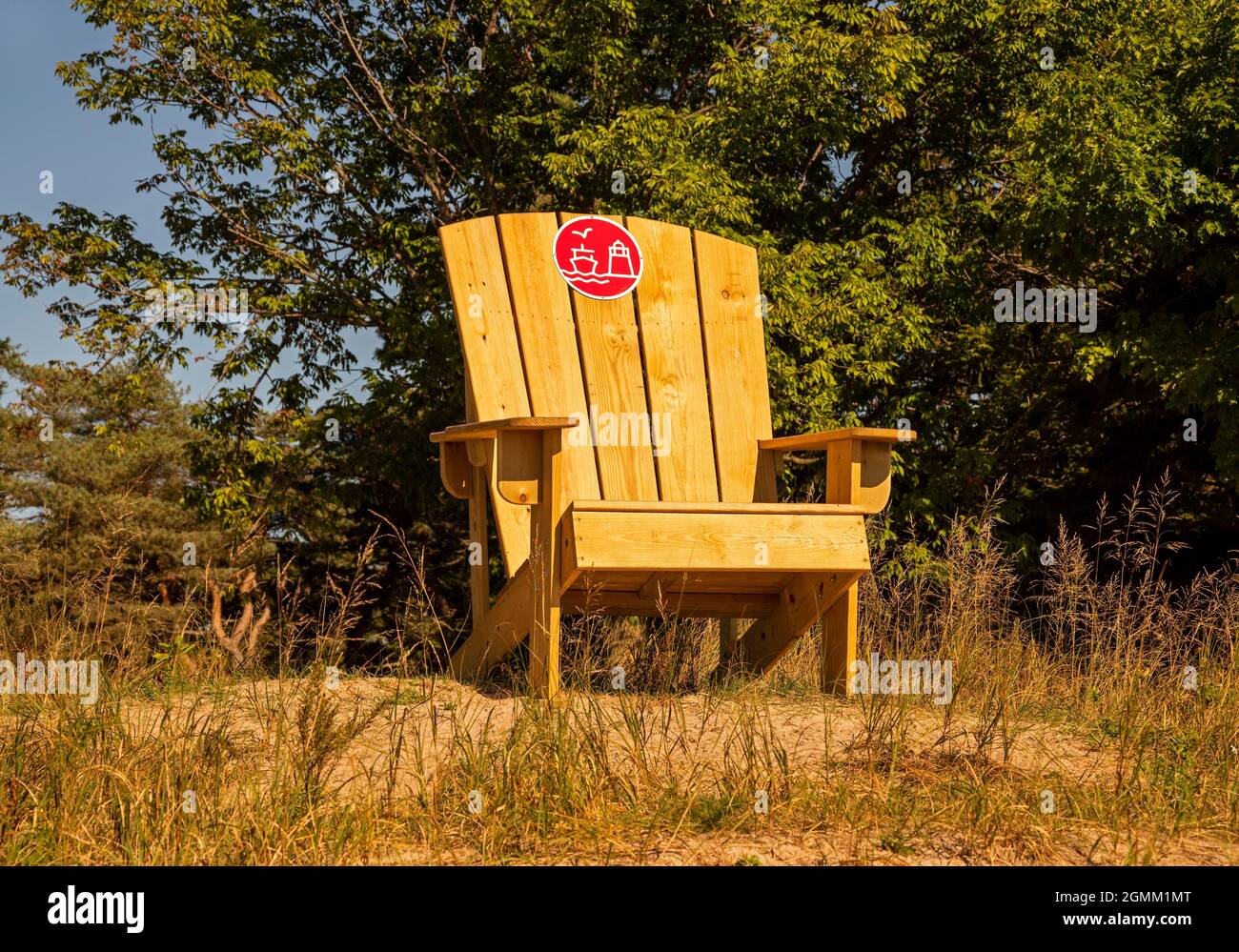 Large Adirondack Chair on sand dune overlooking Lake Michigan beach at ...