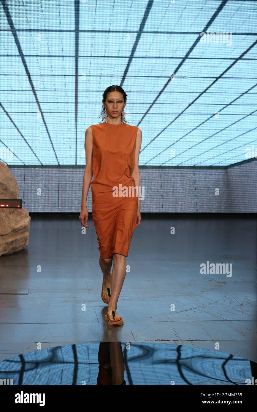 A model walks the runway at the Eftychia Fashion show, during the ...