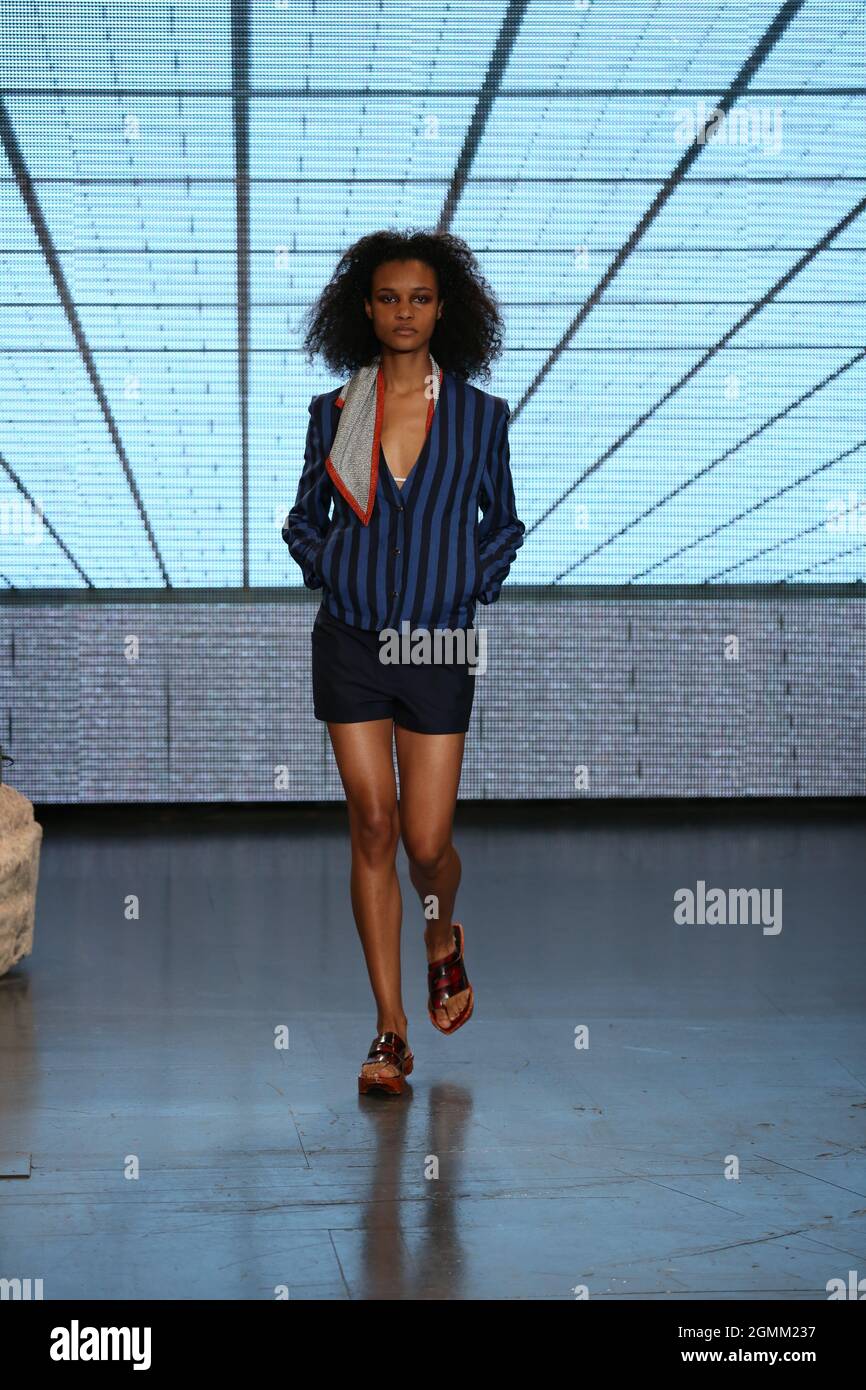 A model walks the runway at the Eftychia Fashion show, during the ...