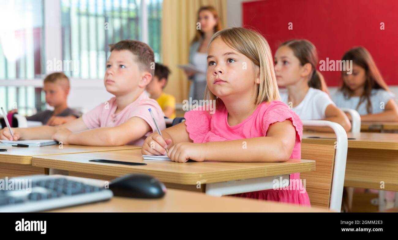 Pupils in classroom Stock Photo - Alamy