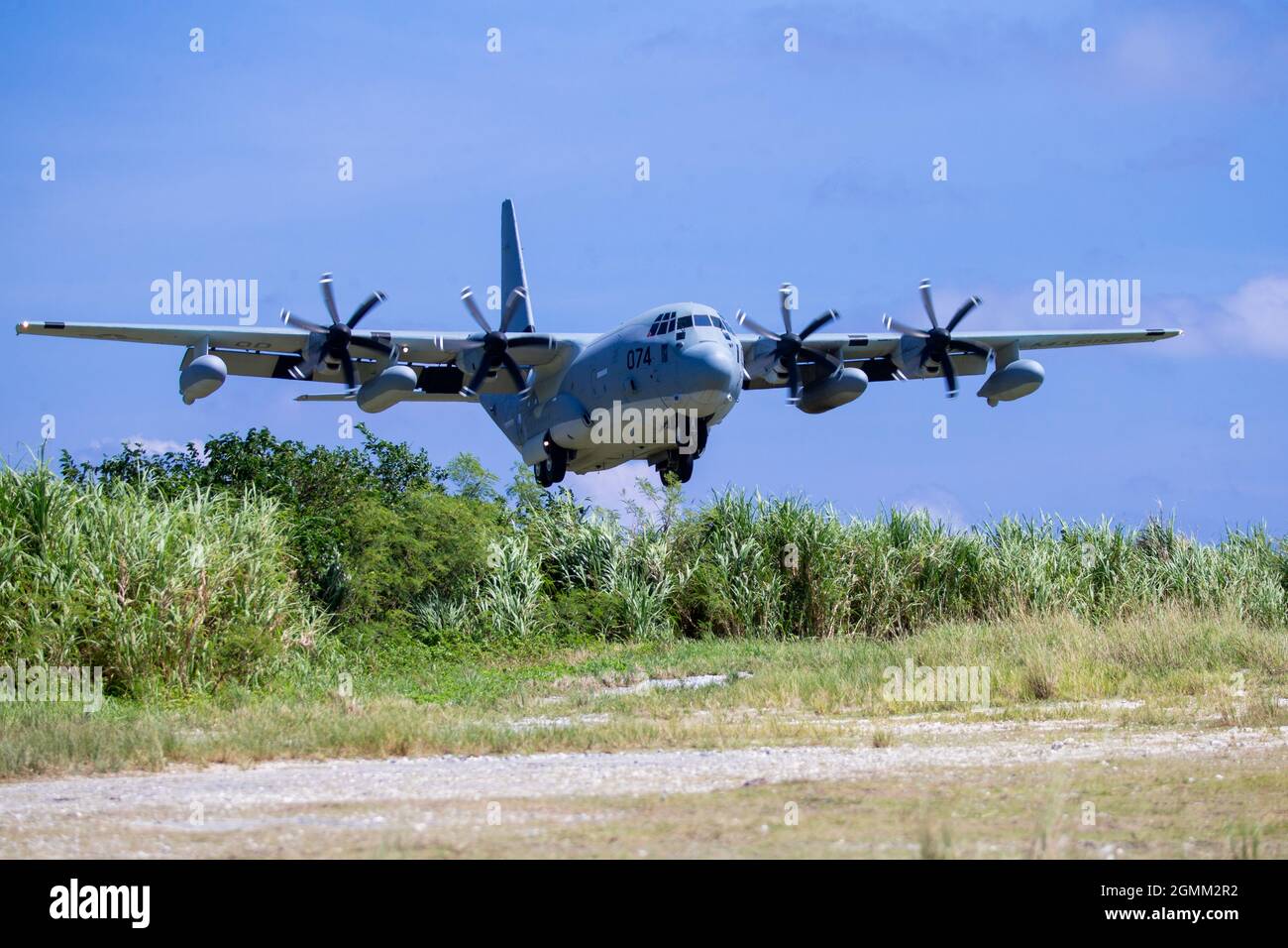 A U.S. Marine Corps KC-130J lands after conducting free fall parachute ...