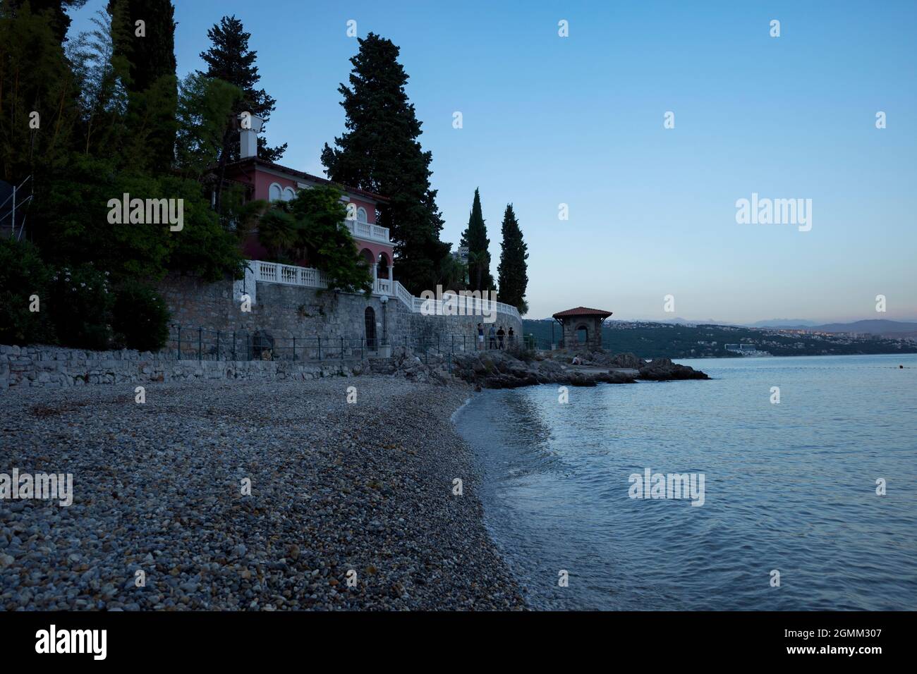 Rijeka, Croatia - August 11, 2021: Evening sea view with rocky beach ...