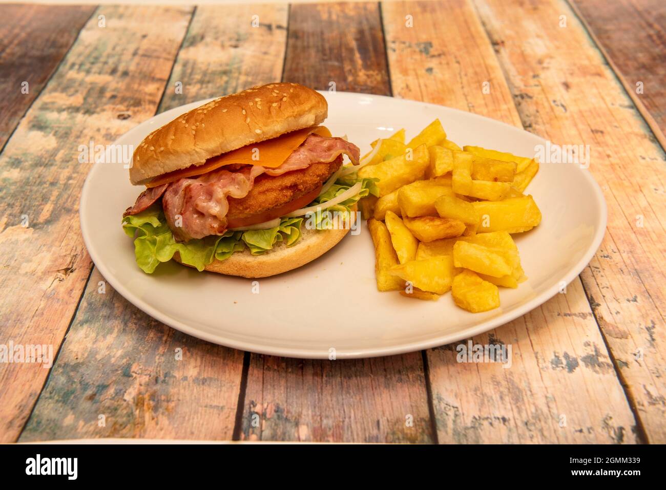 Crispy Chicken Burger with Iceberg Lettuce, Raw White Onion, Fried ...