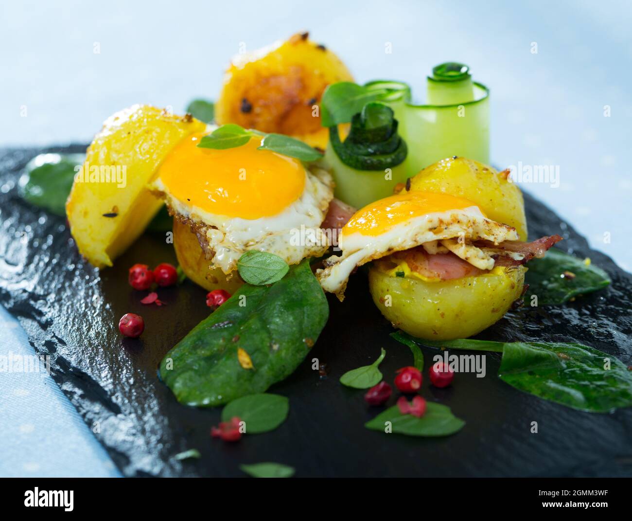 Potato burgers with quail egg Stock Photo - Alamy