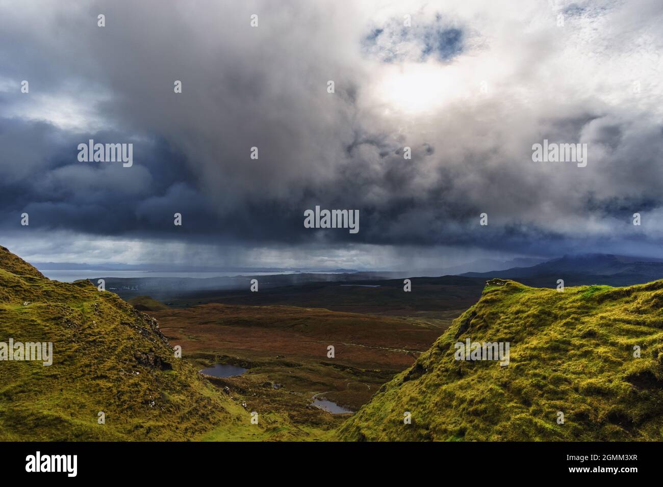 Beautiful landscape with falling rain on green grass and lakes, Isle of ...