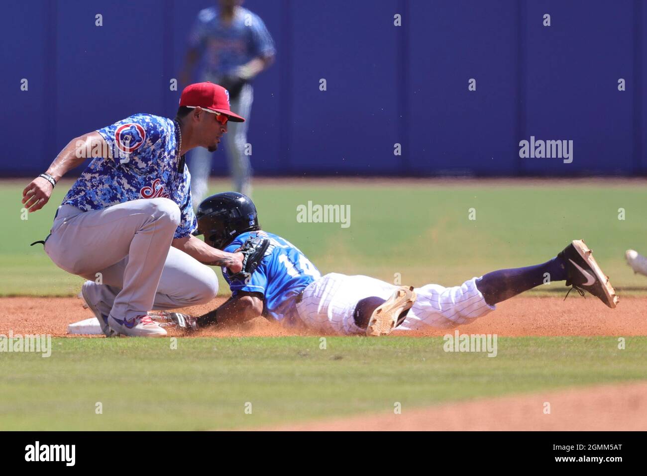 Sep 19, 2021: Biloxi Shuckers infielder David Hamilton (14) slides safe ...