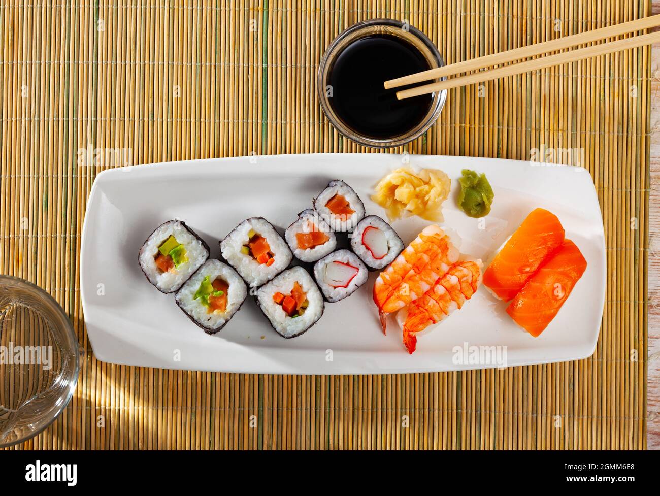 Various of nigiri and hosomaki sushi traditionally served with wasabi ...