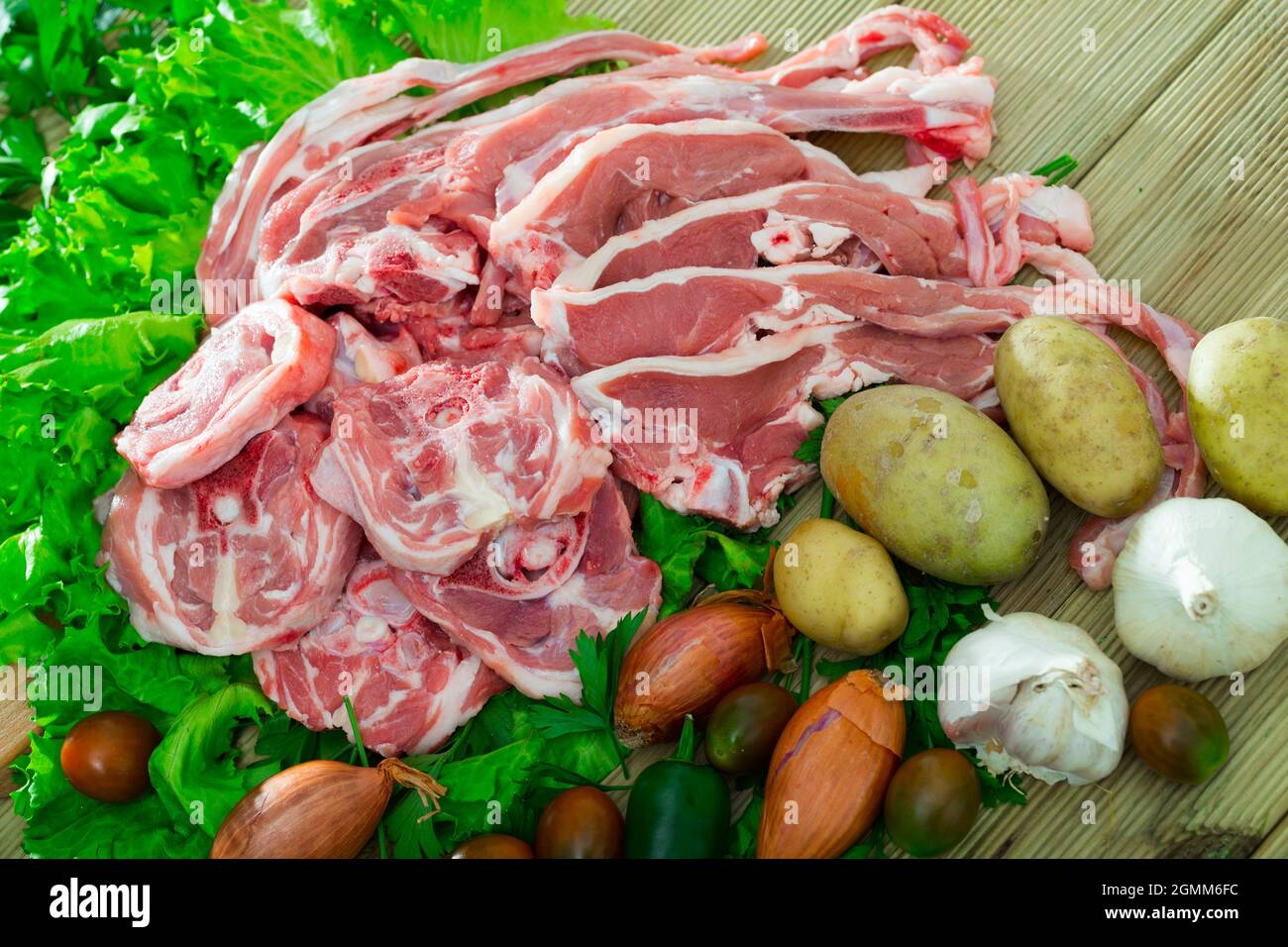 Raw lamb meat with vegetables Stock Photo - Alamy