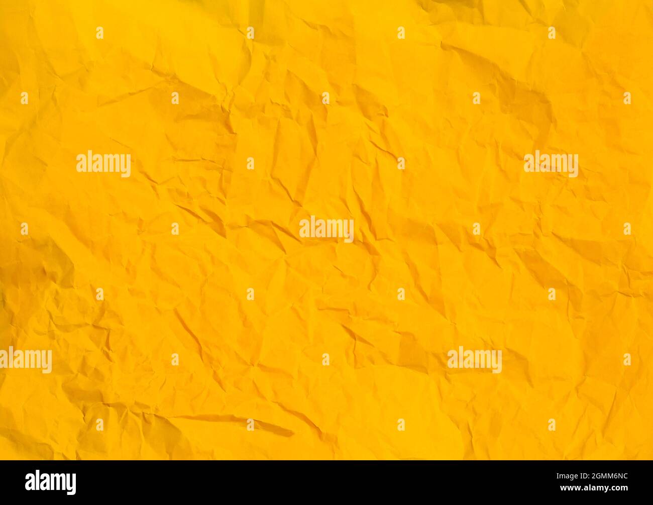 Crumpled yellow paper background texture Stock Photo - Alamy