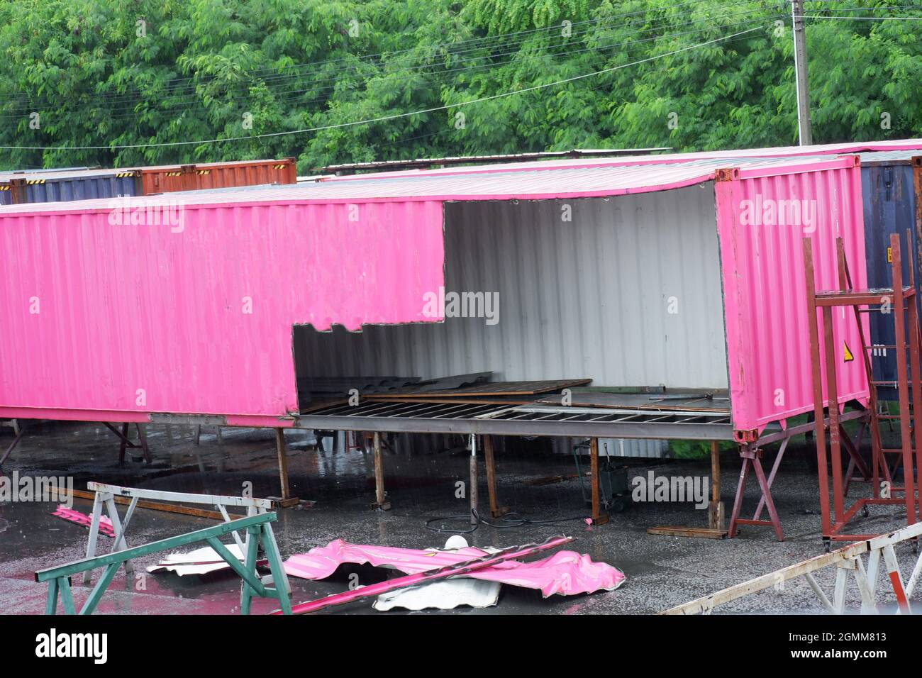Repairing containers in container depot service Stock Photo - Alamy
