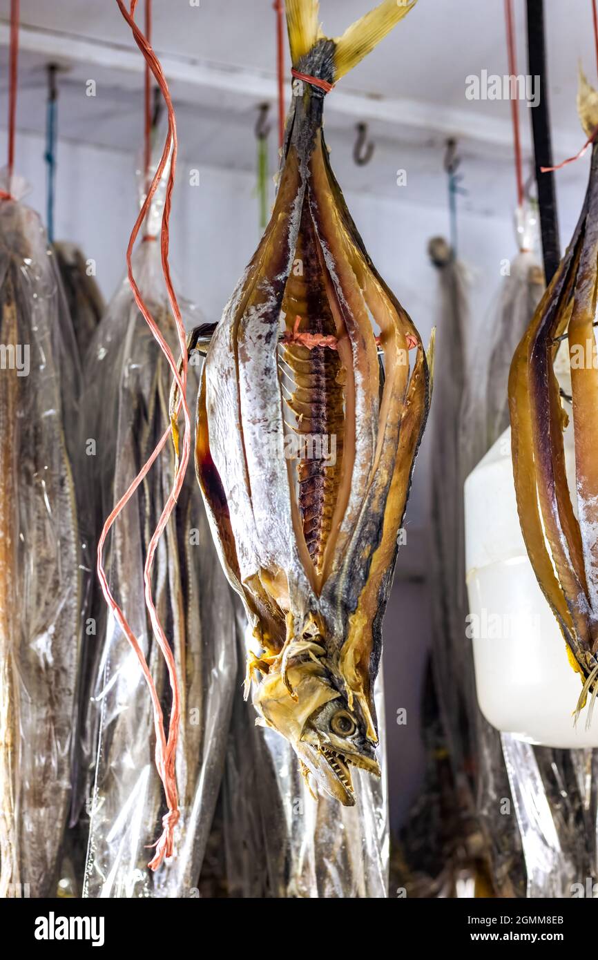 Hanged dried sea fish on a shop in the market Stock Photo - Alamy