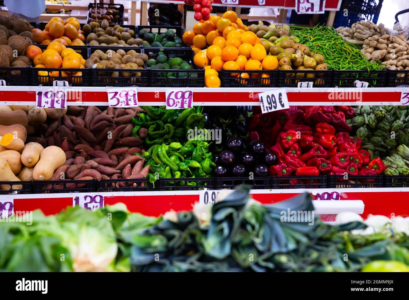 Fresh fruits and vegetables in greengrocery Stock Photo - Alamy