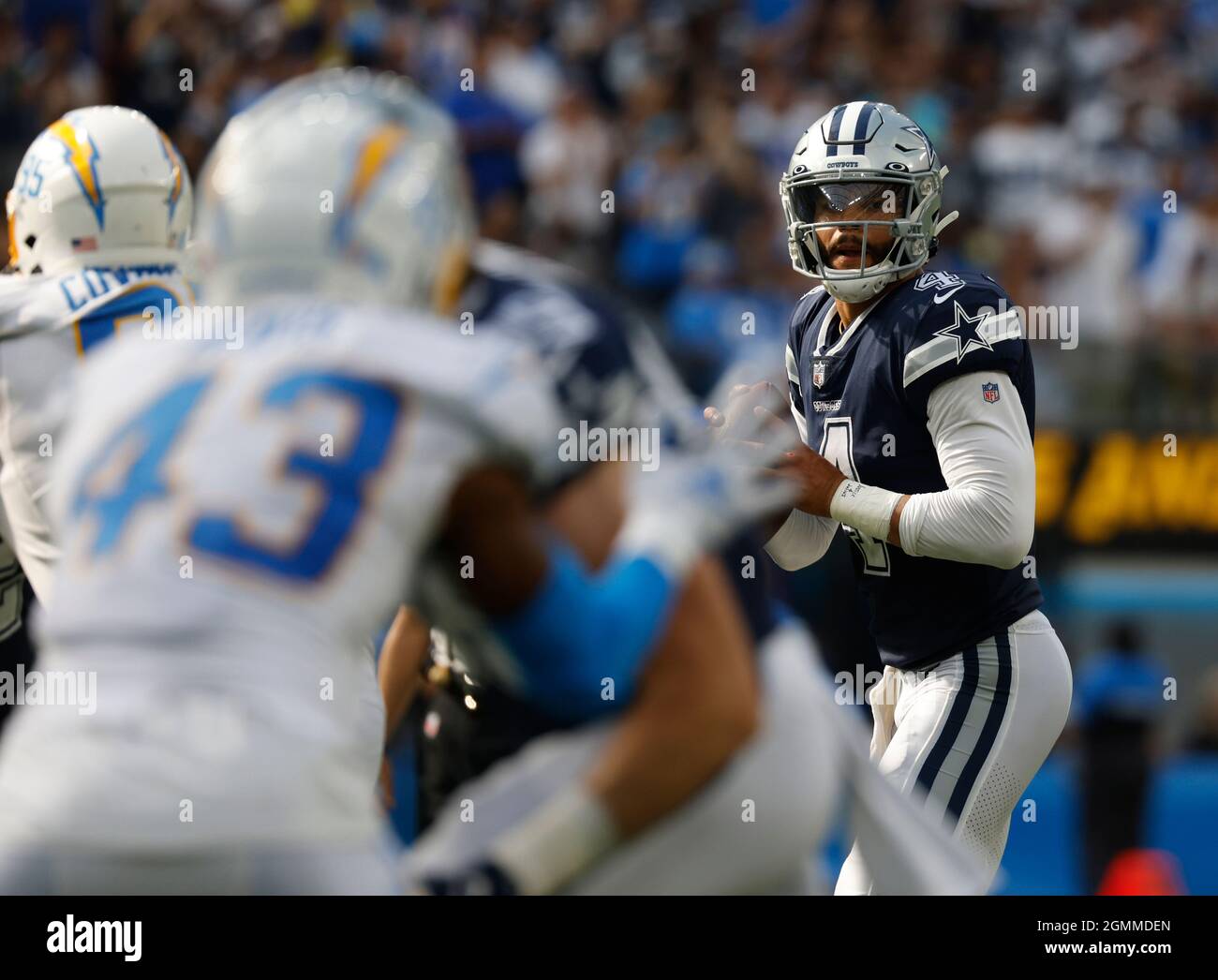 Inglewood, California, USA. 19th Sep, 2021. Dallas Cowboys quarterback Dak Prescott (4) drops ...