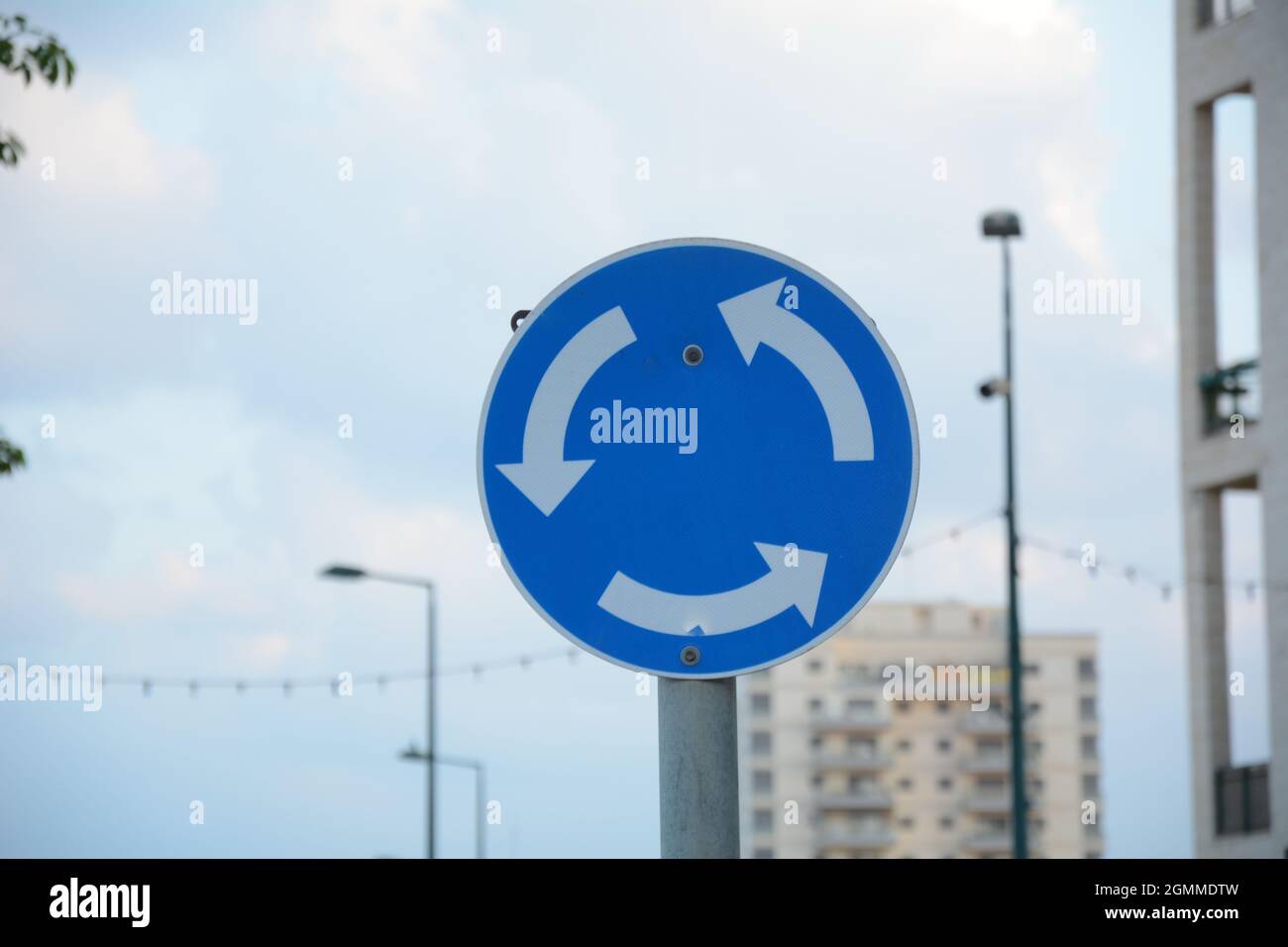 Traffic sign: "Roundabout" .Signs giving orders. Road signs in Israel ...