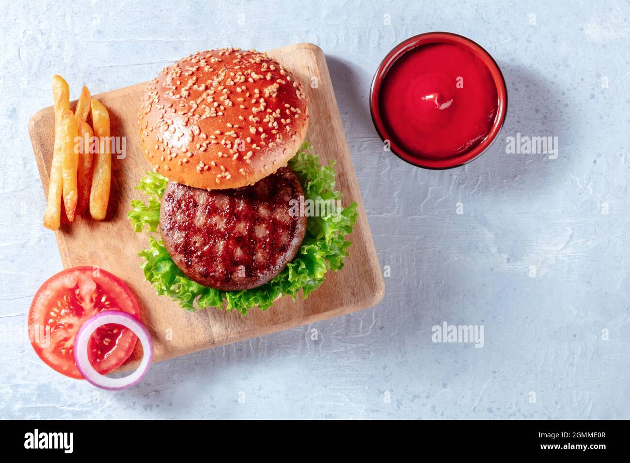 Burger ingredients, overhead flat lay shot with copy space. Hamburger ...