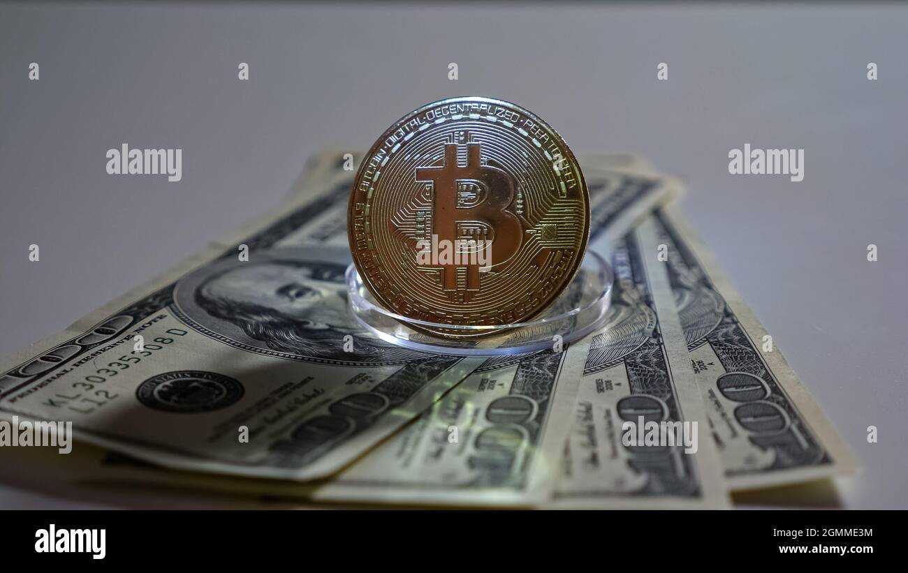 Bitcoin gold coin stands on hi-res stock photography and images - Alamy