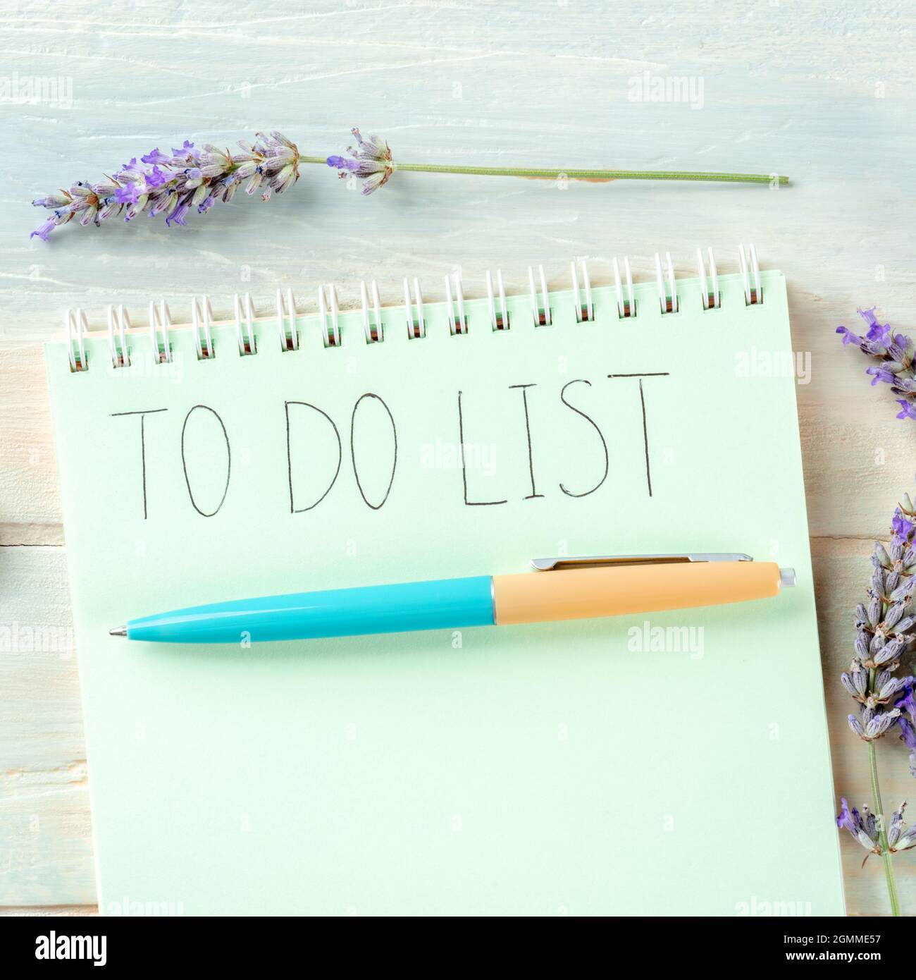 To do list square shot with lavender and a turquoise blue pen. The ...