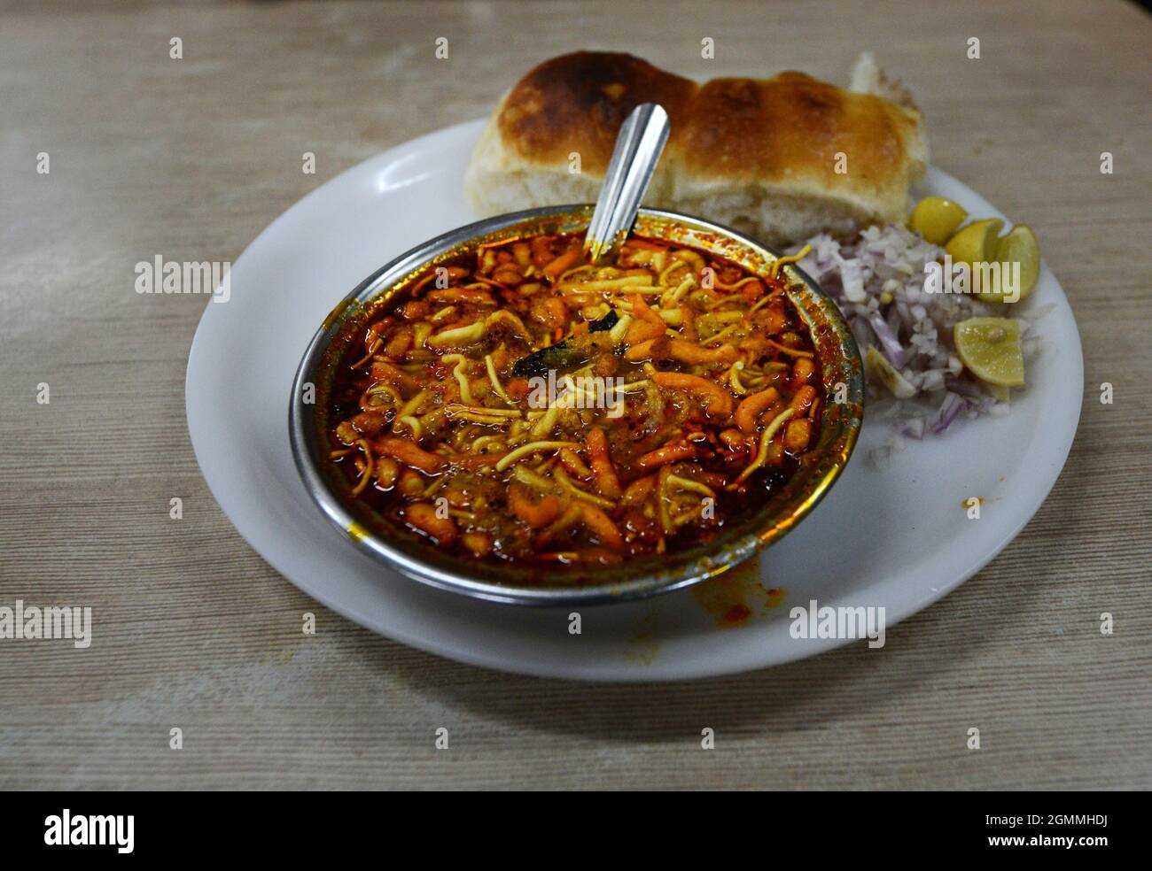 Misal pav is a local Marathi dish popular in Maharashtra, India Stock ...