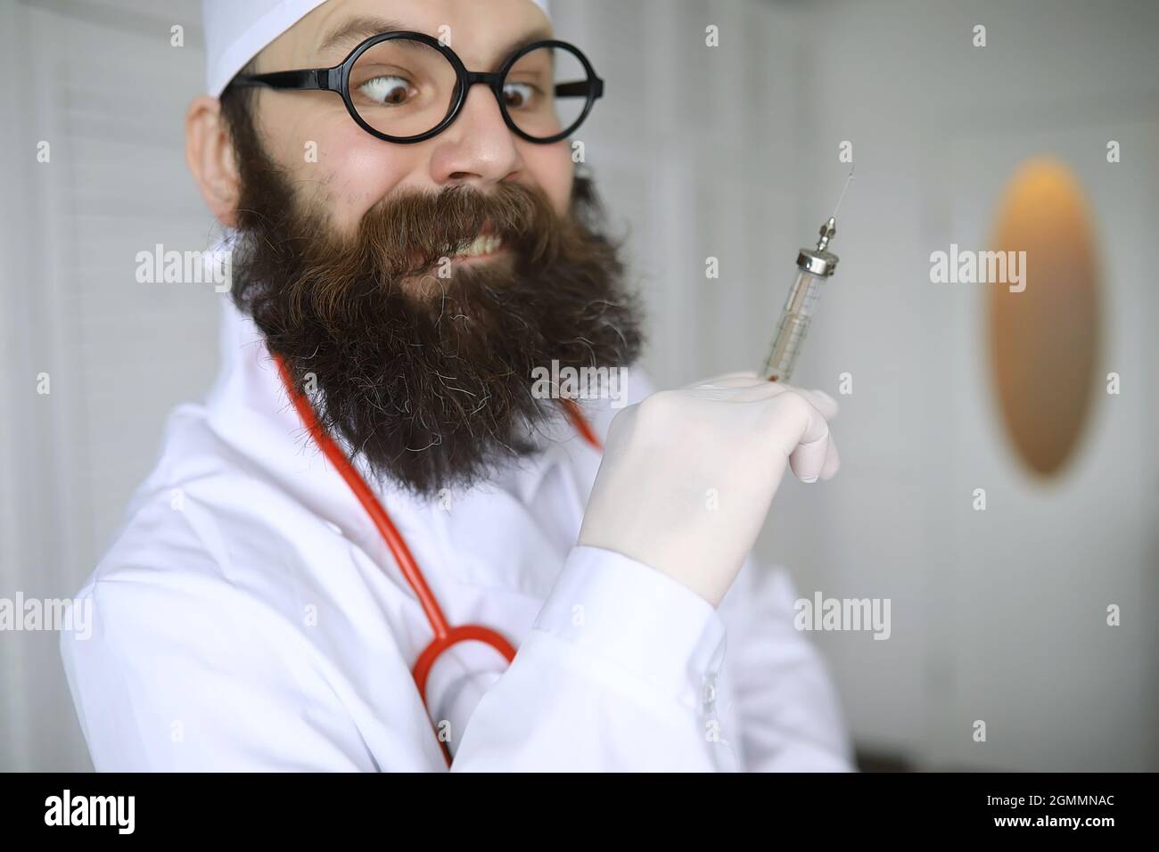 Doctor crazy. Mad beard scientist conducts experiments in a scientific ...