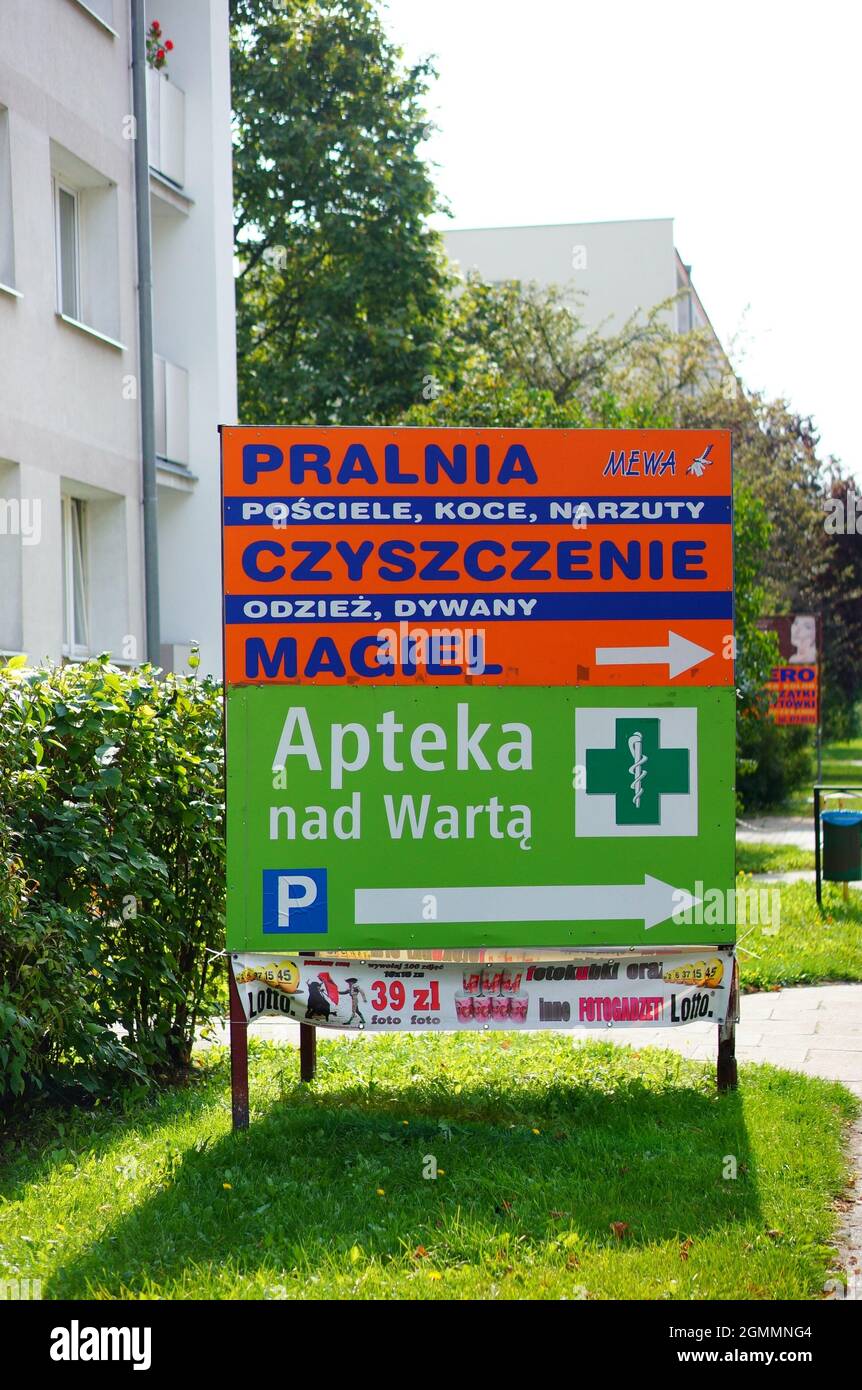 POZNAN, POLAND - Aug 12, 2021: A vertical shot of direction signs ...