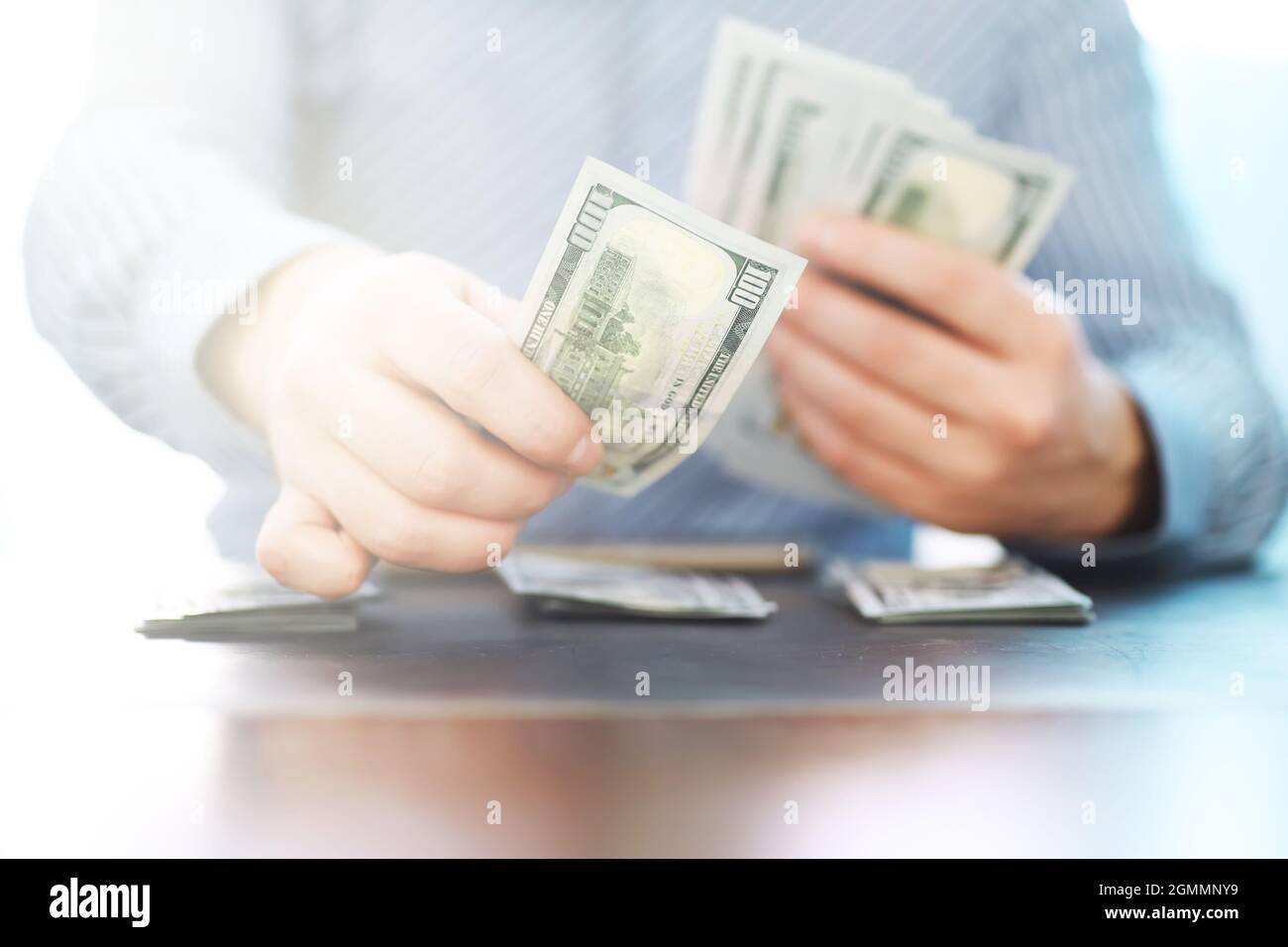 Cash money in a large pile as a finance background. Paper money close ...