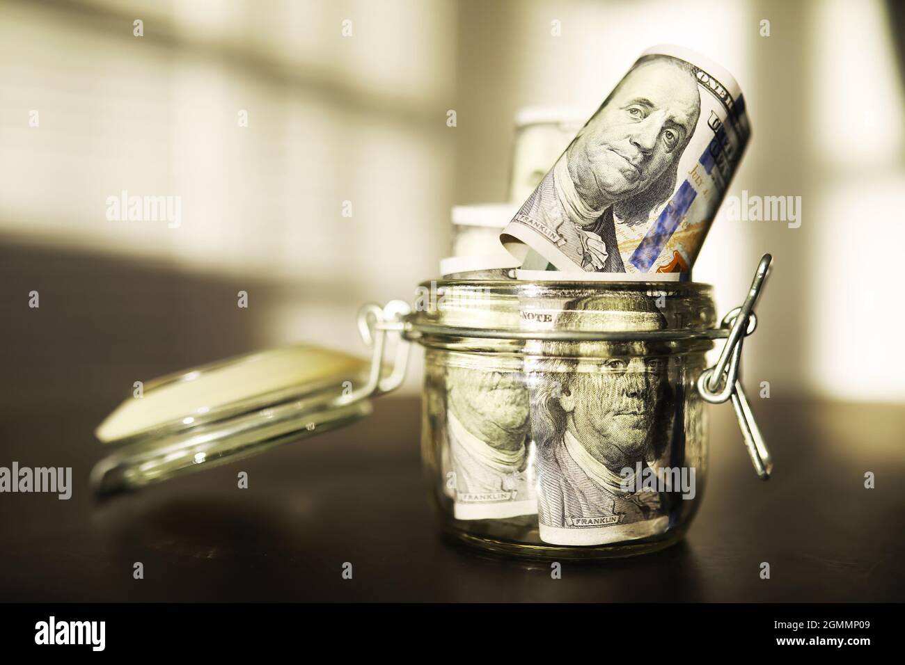 Cash money in a large pile as a finance background. Paper money close ...