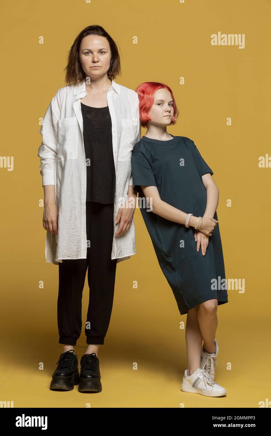 Portrait confident mother and teenage daughter Stock Photo - Alamy