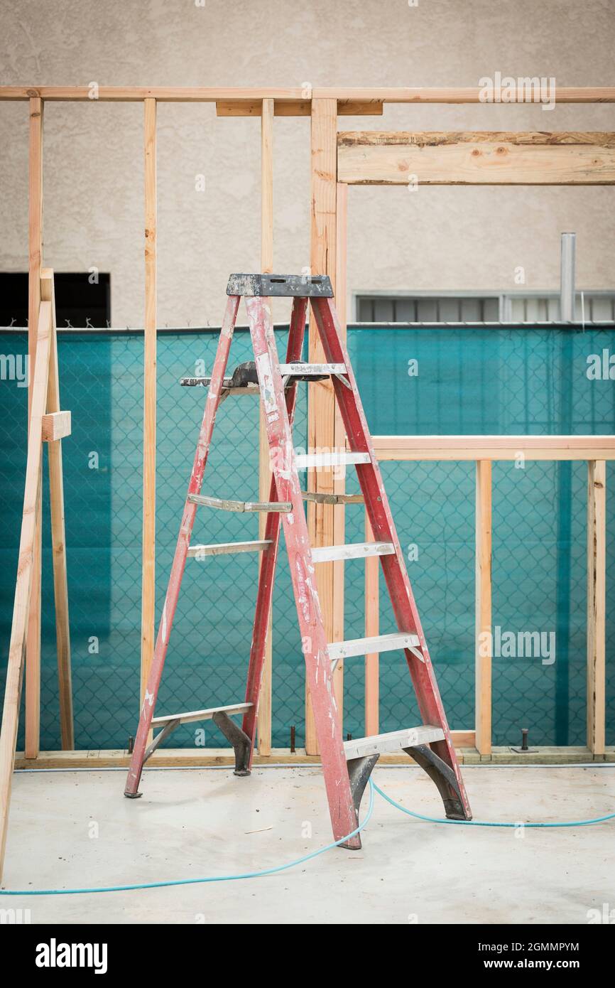 Ladder and construction frame at construction site Stock Photo - Alamy
