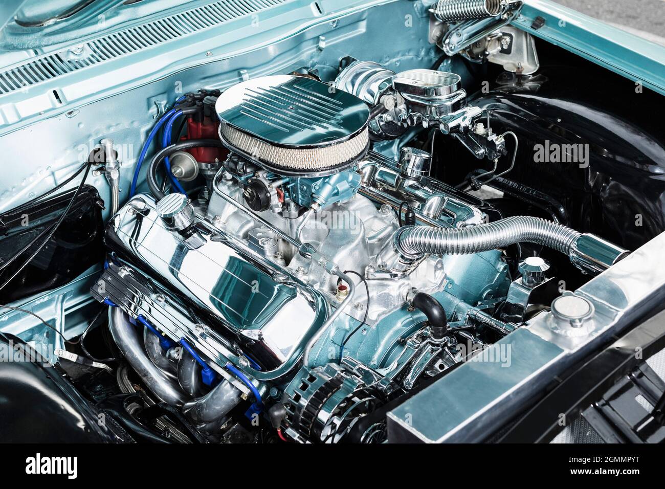 Chrome parts in car engine Stock Photo - Alamy