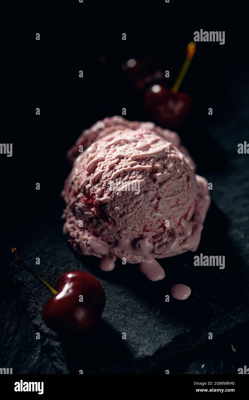 High angle of yummy gelato scoop with smooth texture and shiny surface ...