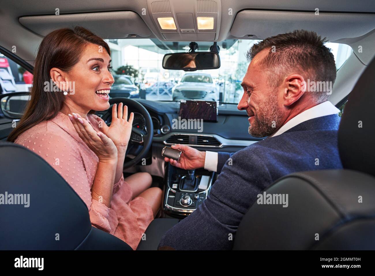 Joyful family inside car hi-res stock photography and images - Alamy