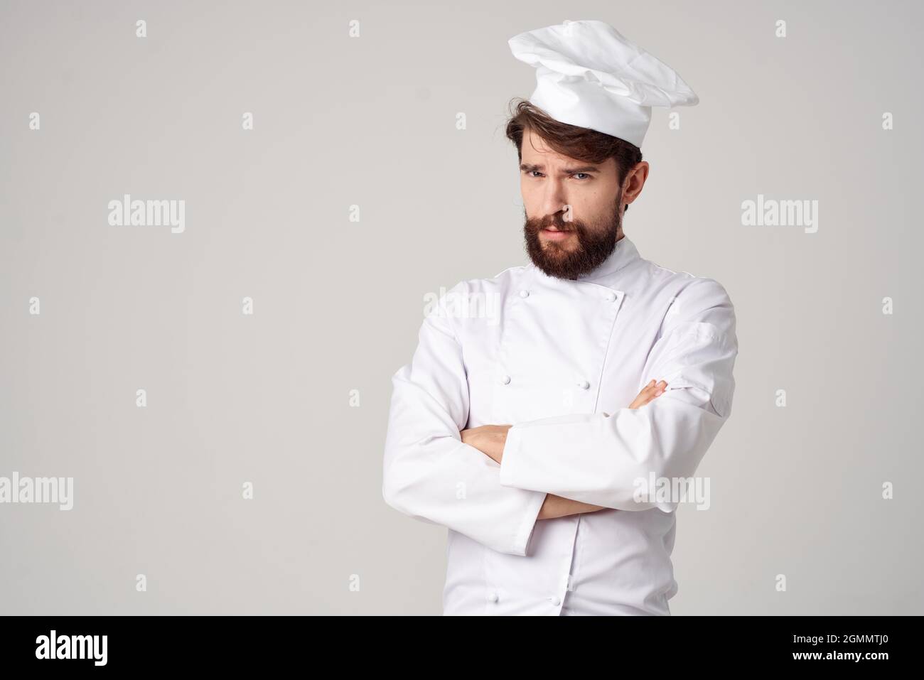 male cook work uniform profession kitchen posing studio Stock Photo - Alamy