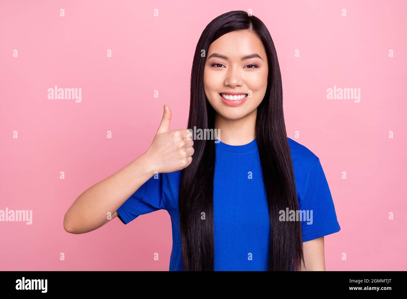 Photo of attractive young happy woman make thumb up good mood recommend ...