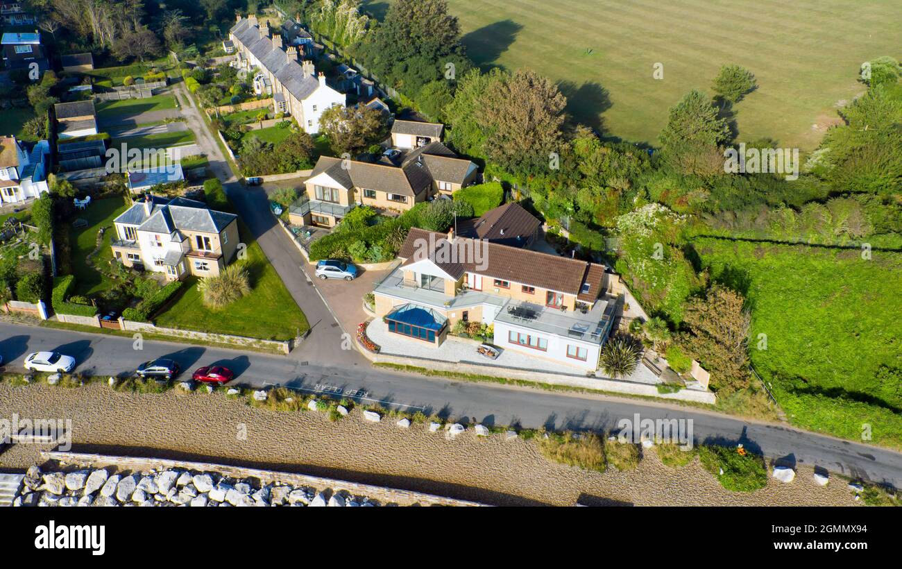 Cose-up. aerial view of some seafront houses at Oldstairs Bay ...